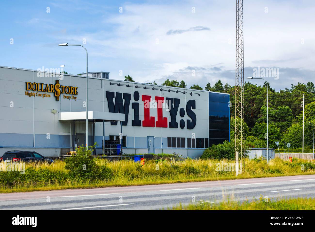Willys and Dollar Store building with visible logos, located along a ...