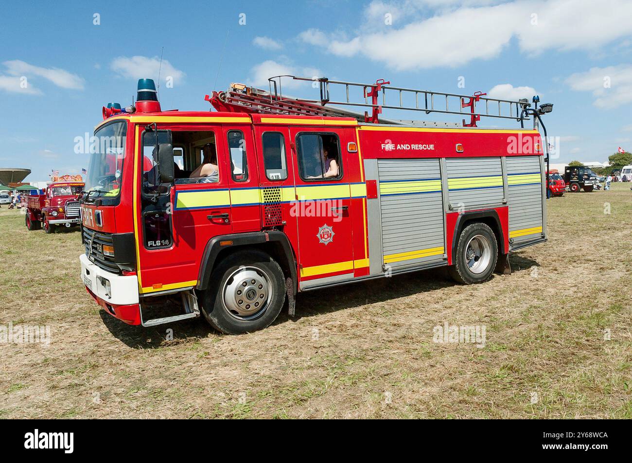 A Volvo fire and rescue truck drives around the display ring at ...