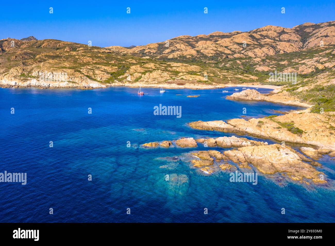 Aerial view of Corsican rocky coast with blue water of Mediterranean ...