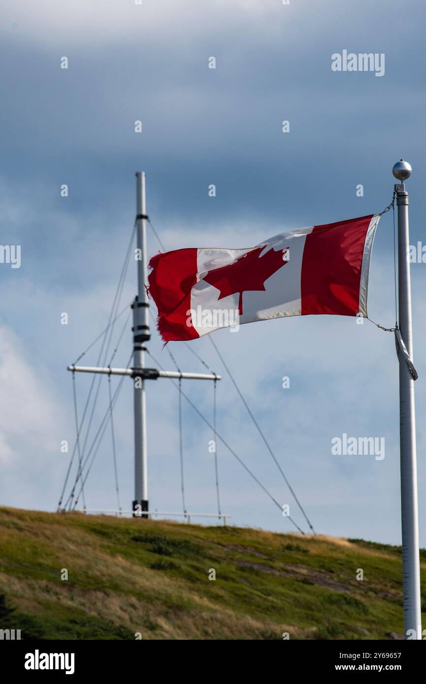 Canadian flag flying at Cape Spear Lighthouse National Historic Site in ...