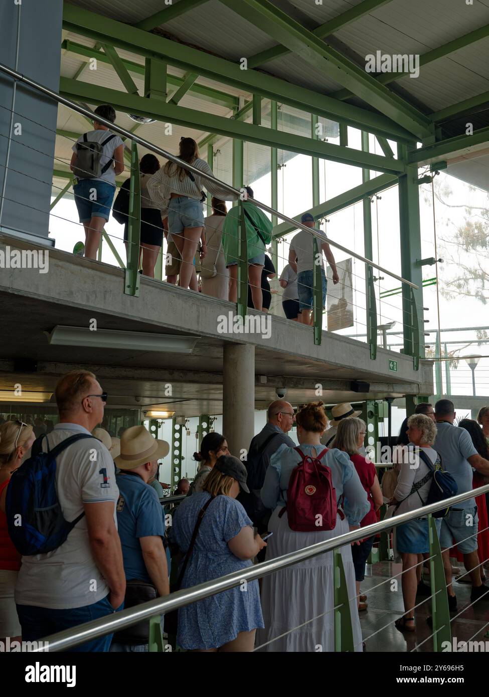 Busy crowd waiting in line at funchal cable car station Stock Photo - Alamy