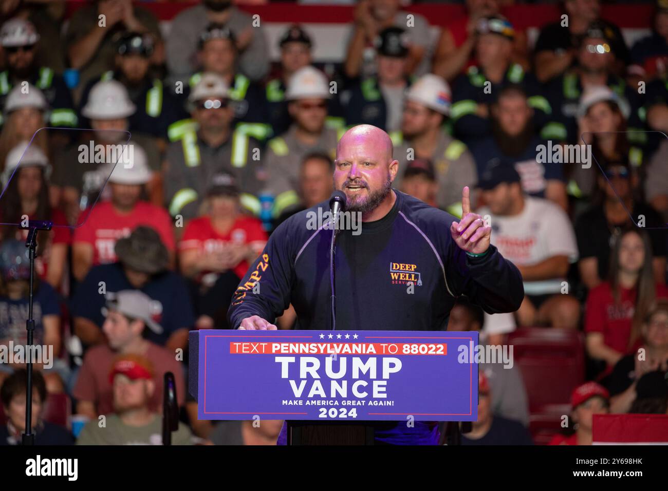 John Sabo, a vice president with Deep Well Services, speaks before ...