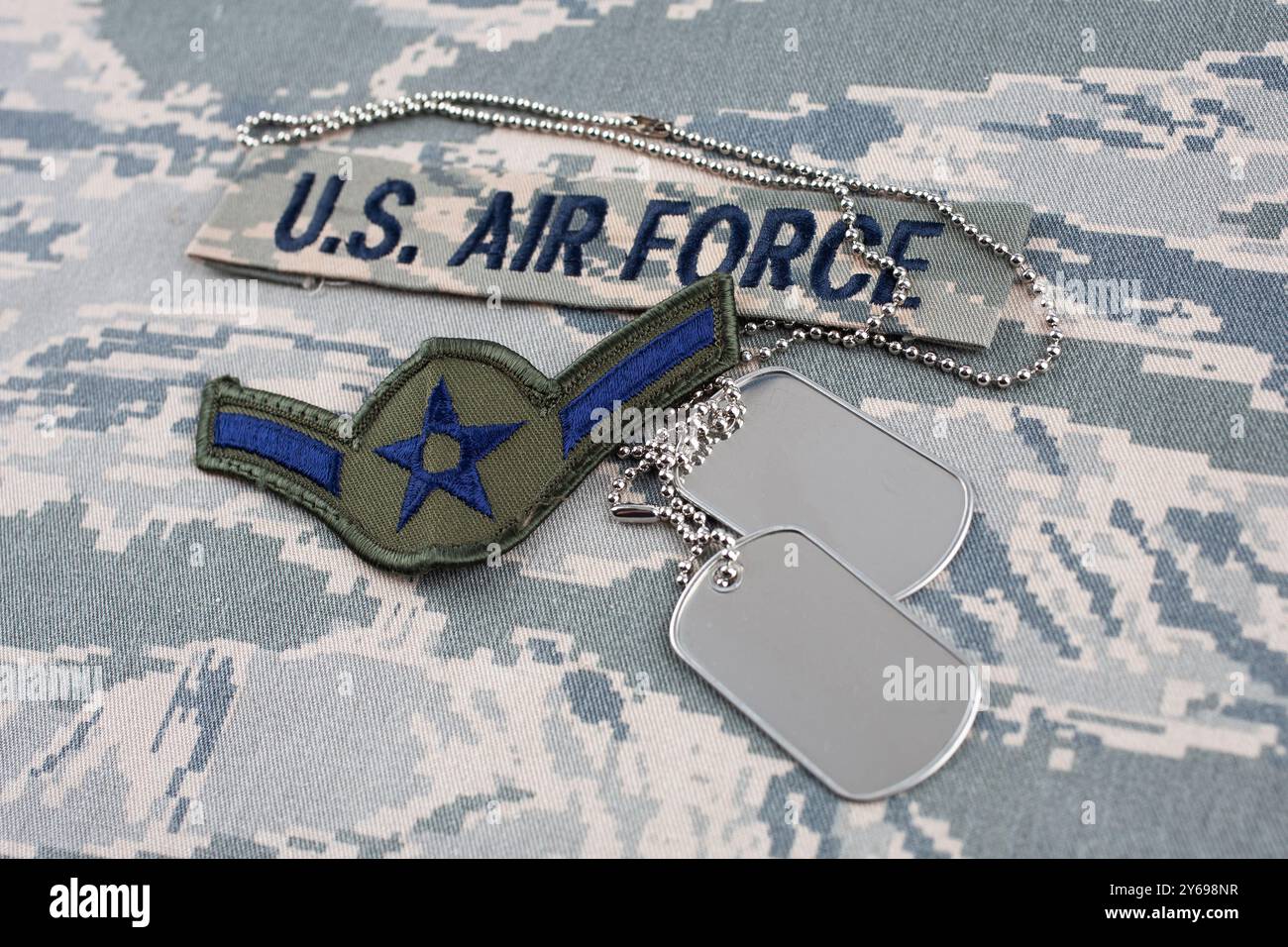 US AIR FORCE branch tape and Airman rank patch and dog tags on digital ...