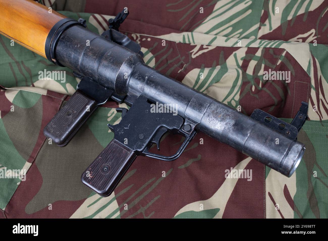 rocket propelled grenade launcher RPG 7 on camo uniform background ...