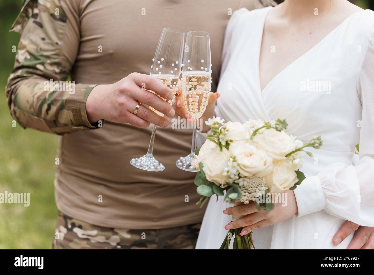 Romantic Military Wedding Toast with Champagne Glasses and Bridal ...
