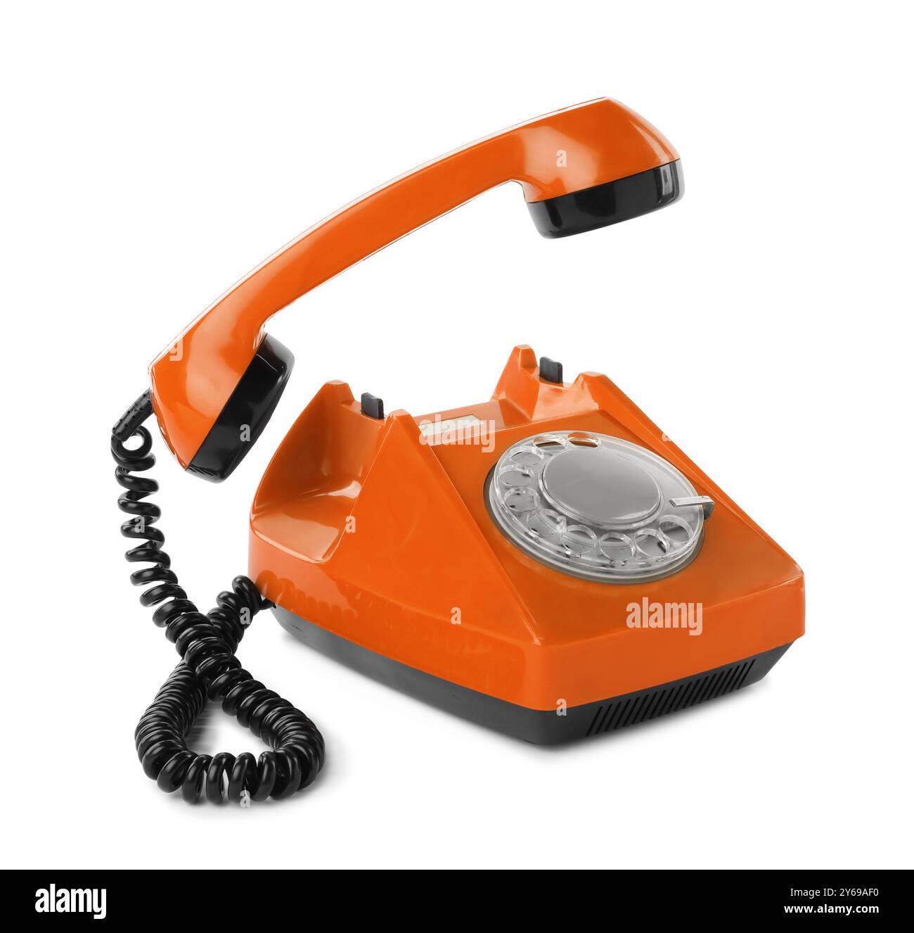 Old orange telephone with rotary dial isolated on white Stock Photo - Alamy
