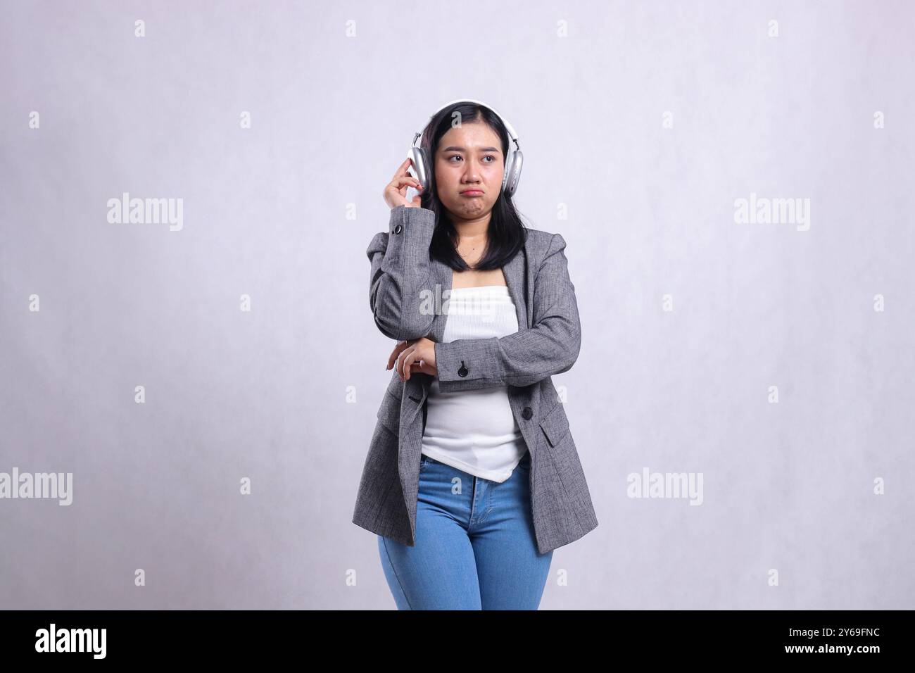 beautiful adult lady office pouting candid hugging holding and wearing ...