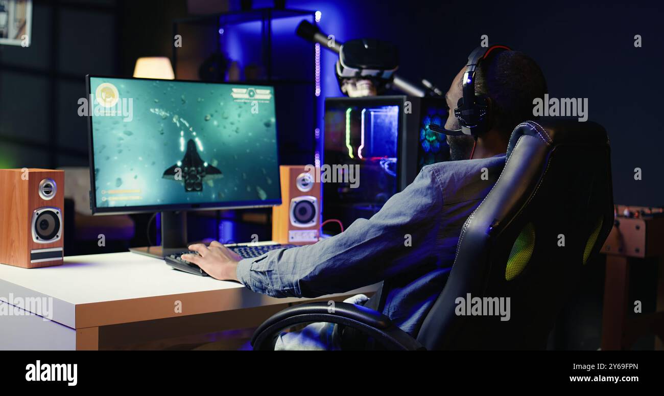 Gamer feeling overjoyed after winning hi-res stock photography and ...