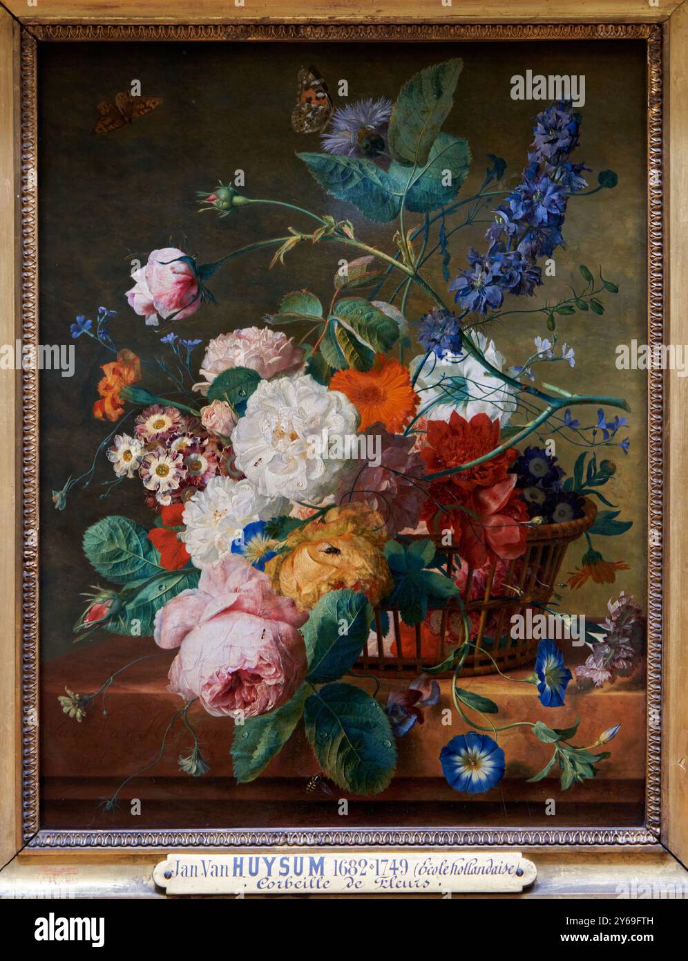 Basket of flowers with two butterflies hi-res stock photography and ...