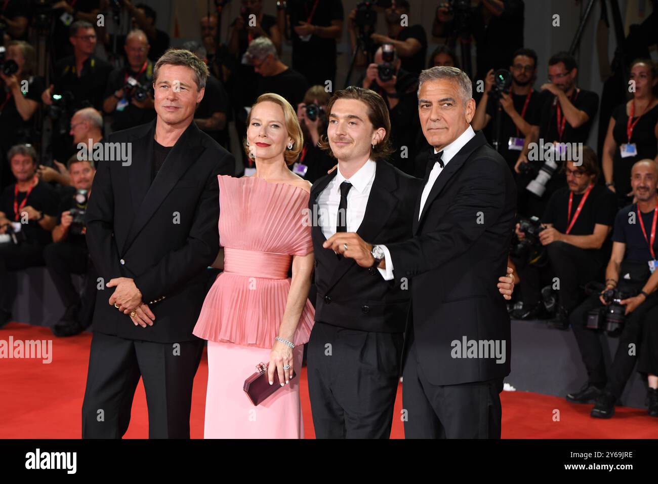 Brad Pitt, Amy Ryan, Austin Abrams, George Clooney attend the "Wolfs" red carpet during the 81st ...