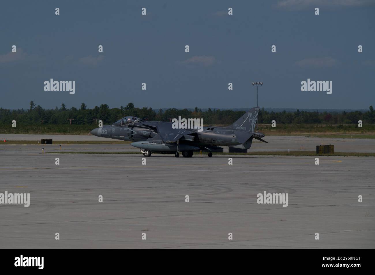 A United States Marine Corps AV-8B Harrier II taxis to the runway for ...