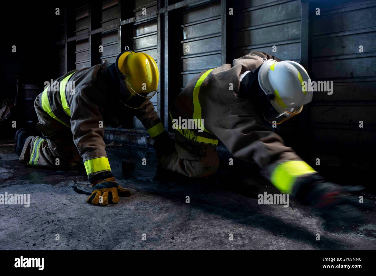 CENTAM SMOKE participants crawl through zero-visibility training during ...