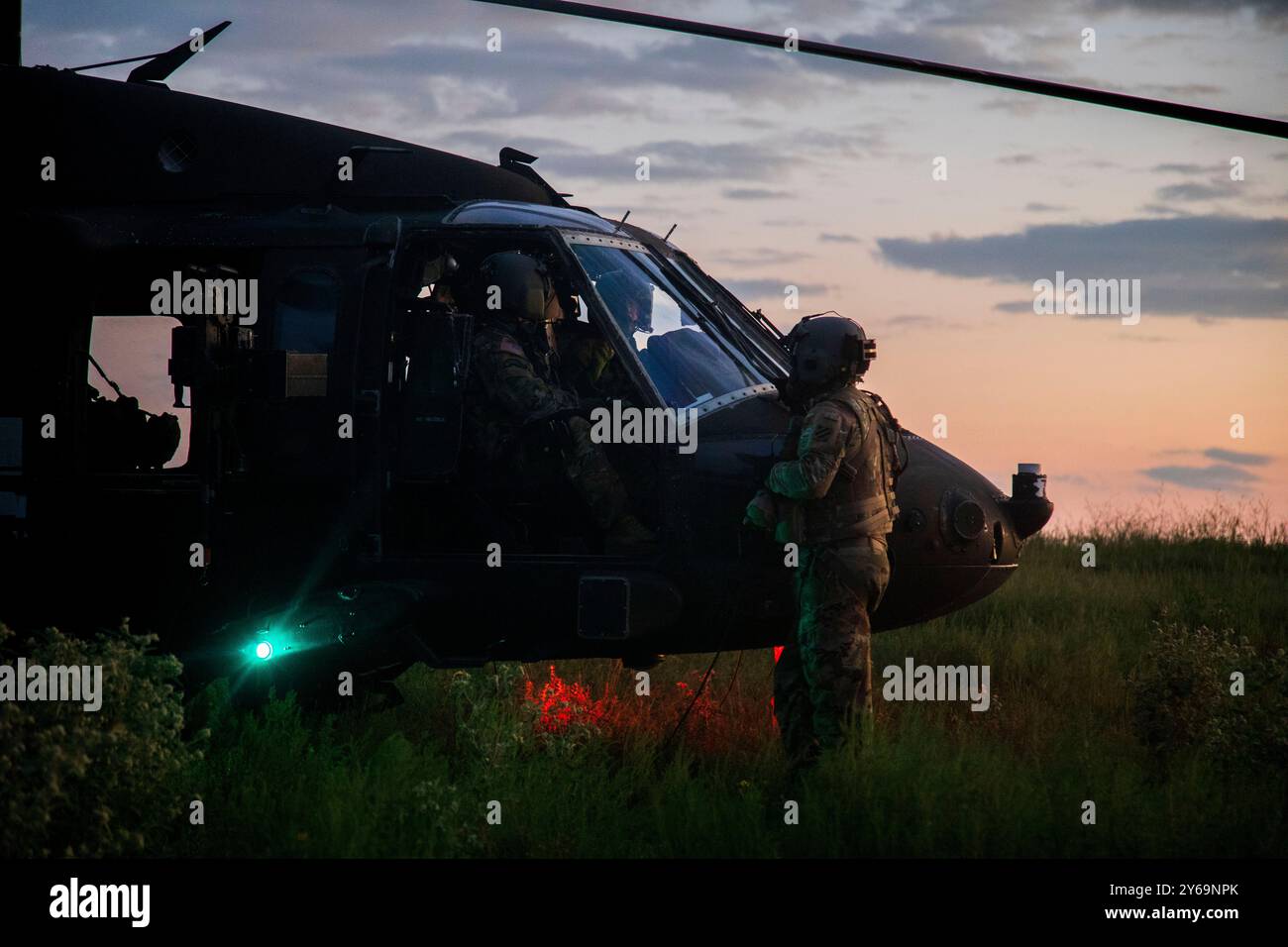 U.S. Army UH-60 flight crew members assigned to 2nd Battalion, 3rd ...