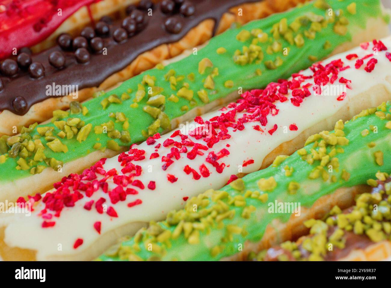 Crispy wafer tube adorned with edible embellishments.Assorted wafer ...