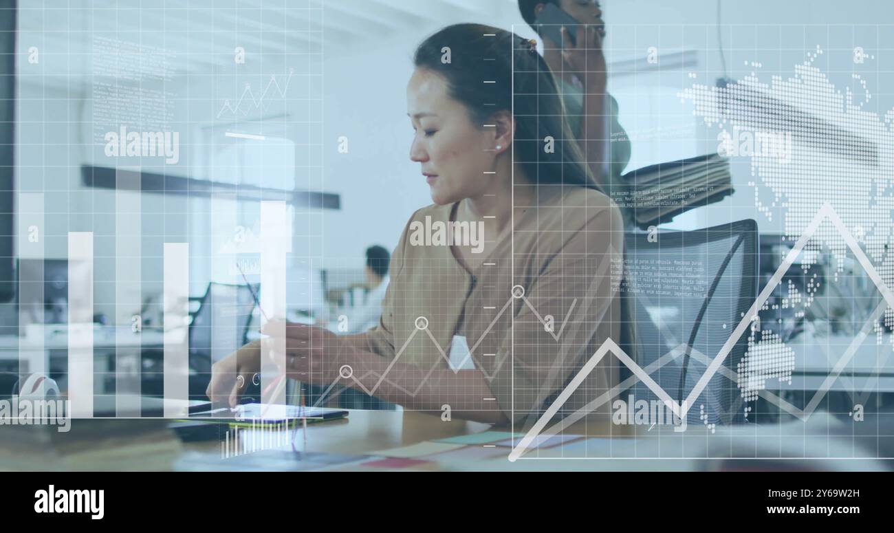 Business woman analyzing graphs hi-res stock photography and images - Alamy