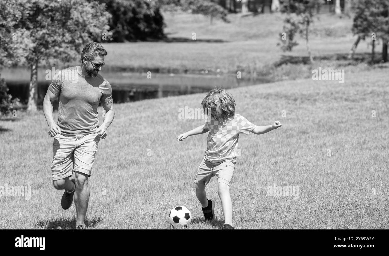 Father and child son teaming up outdoor. Father dad and son enjoying ...