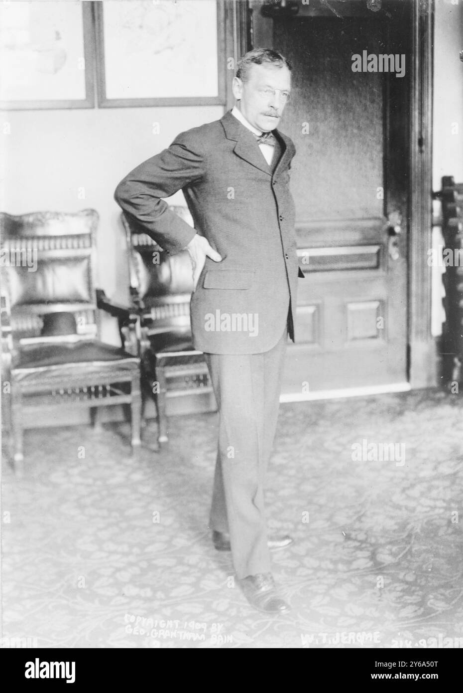William T. Jerome, full-length portrait, standing, facing right, c1909 ...