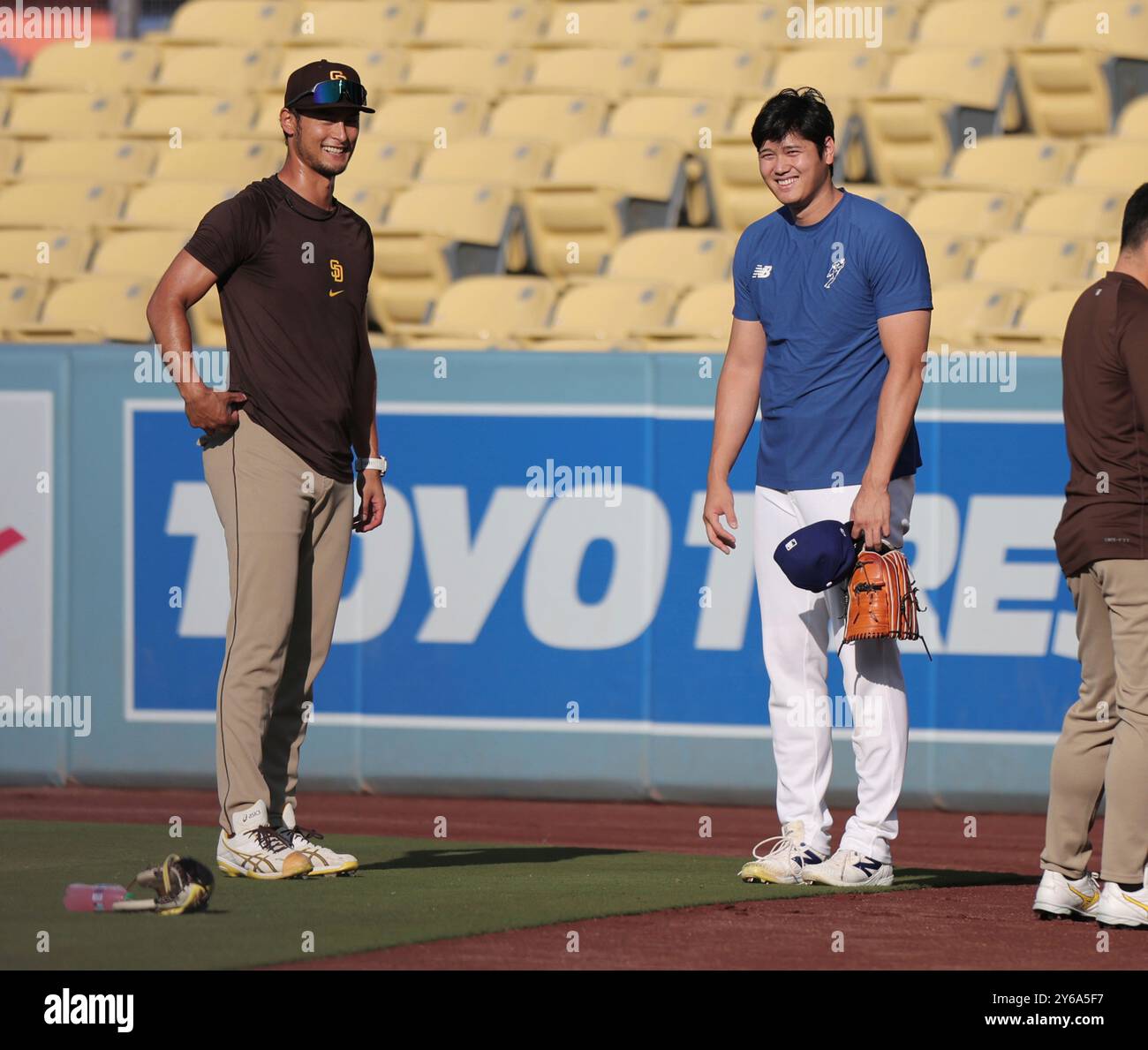 Shohei Ohtani of Los Angeles Dodgers (R) talks with Yu Darvish of San ...