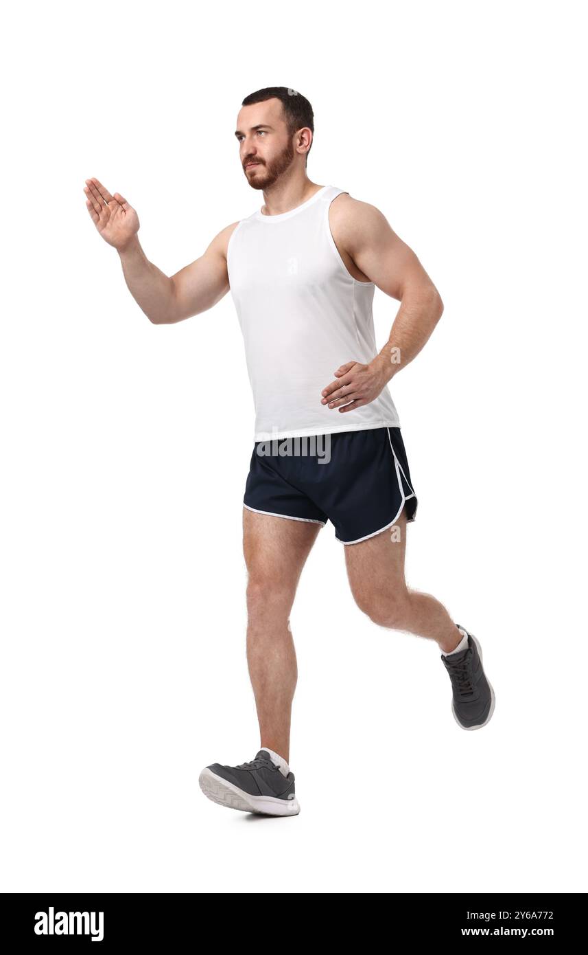 Handsome young man running on white background Stock Photo - Alamy