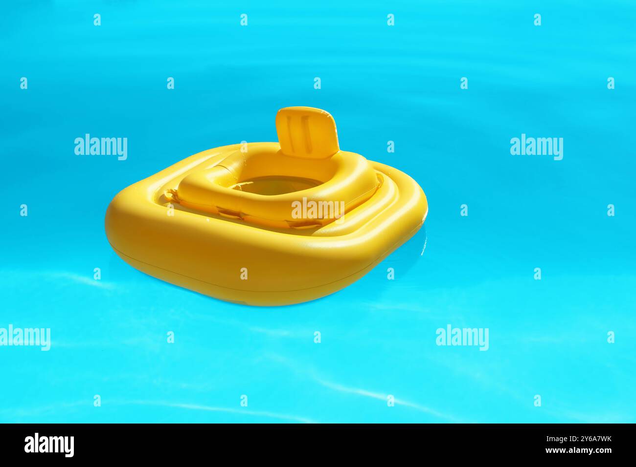 Yellow float in swimming pool at luxury resort Stock Photo - Alamy
