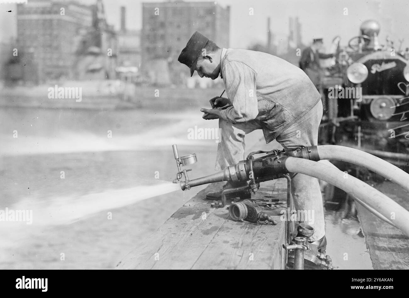 Testing fire engines, Photo shows competition of motor pumper engines ...