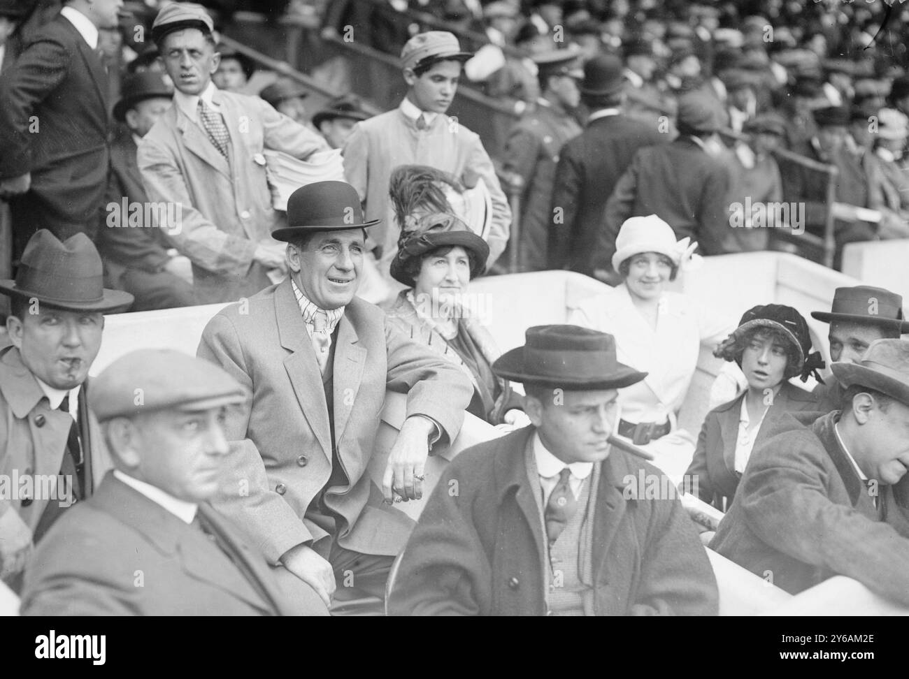 Jim Corbett & Mrs. Marquard at game, Boxer Jim Corbett (center) and ...