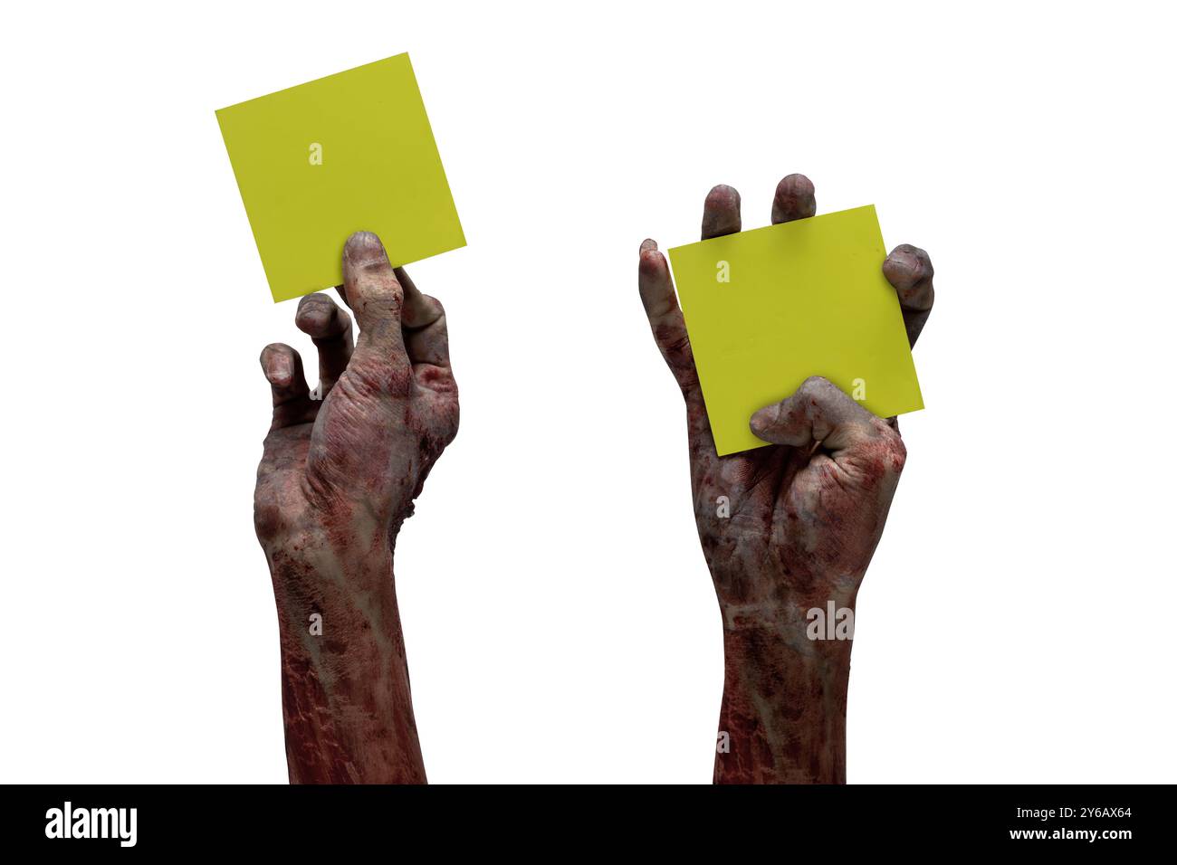 Two zombie hands with a bloody wound holding notes paper. Blank notes ...