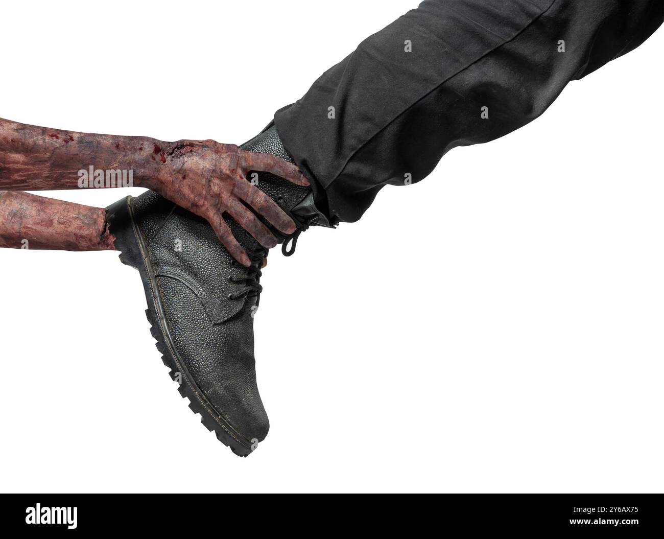 A zombie hand with a bloody wound grabs a human shoe. Zombie, devil ...