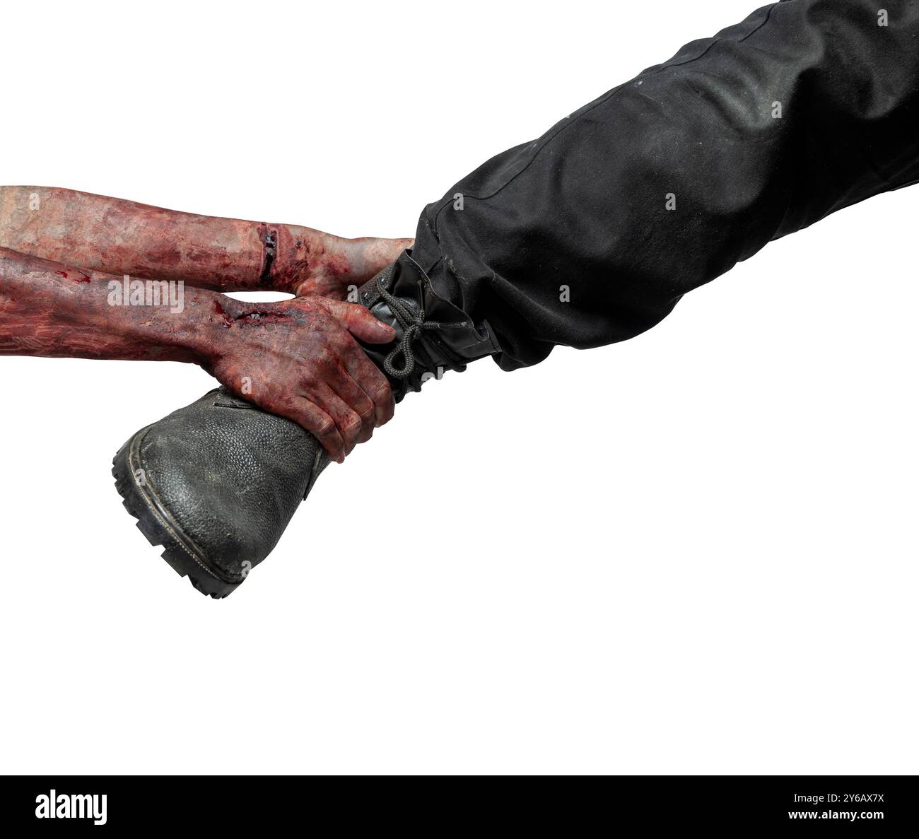 A zombie hand with a bloody wound grabs a human shoe. Zombie, devil ...