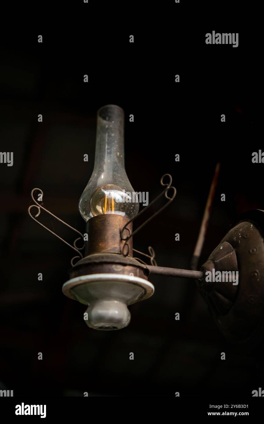Antique copper wall lamp that gives a classic feel Stock Photo - Alamy