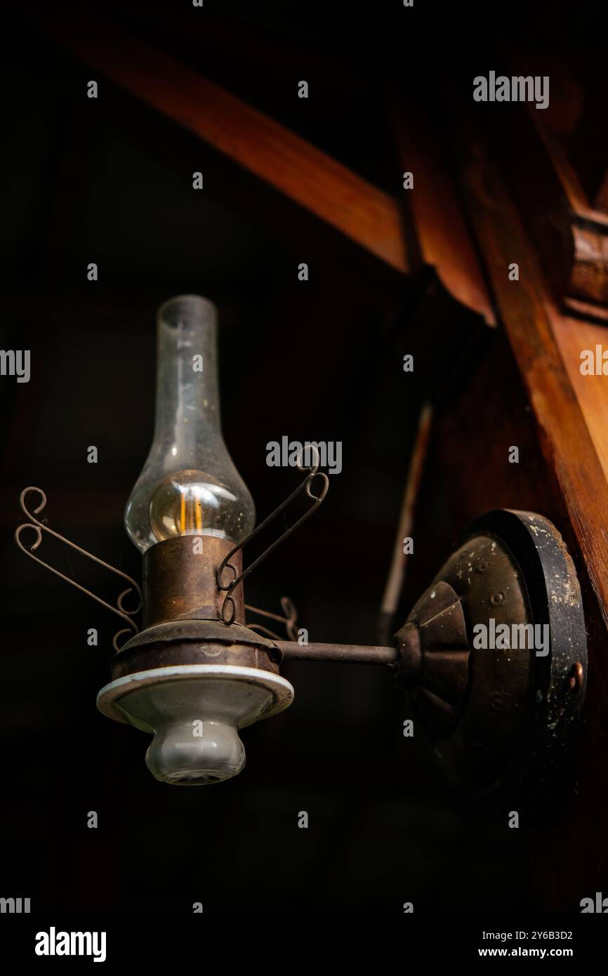 Antique copper wall lamp that gives a classic feel Stock Photo - Alamy