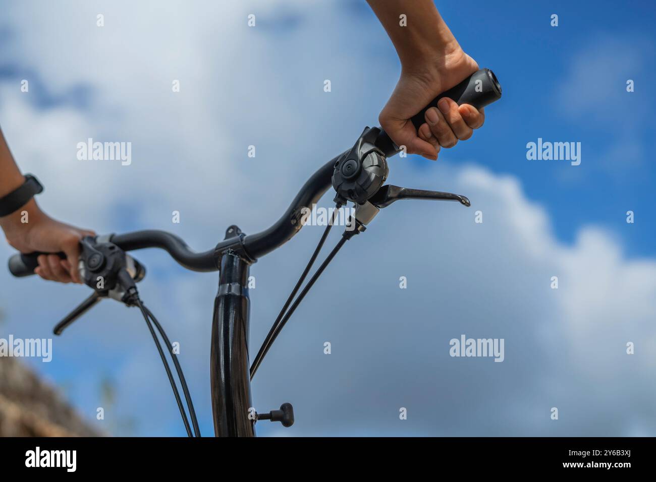 male biker hand holding handle bar Stock Photo - Alamy