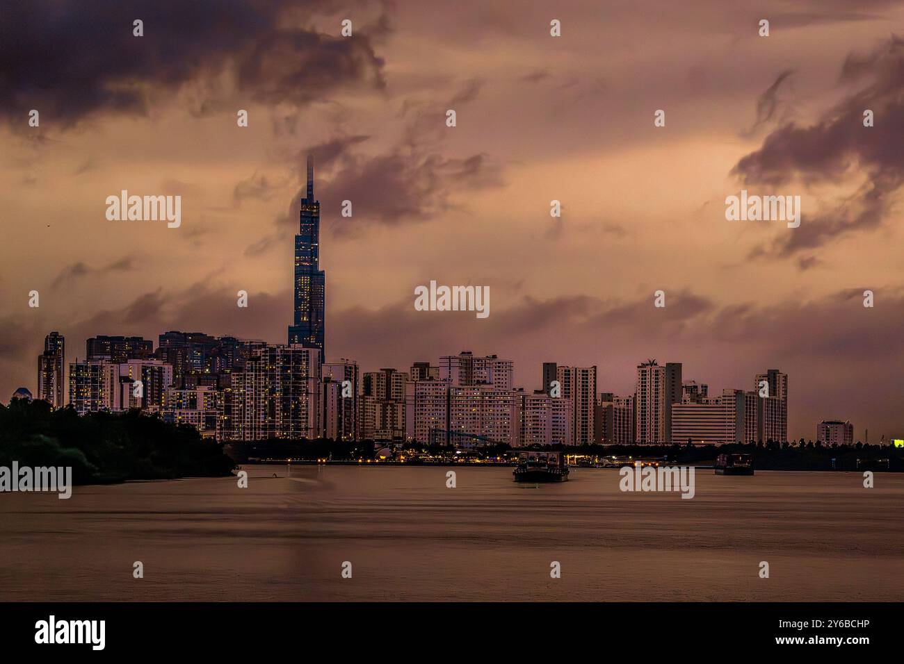 Saigon bay and city on a stormy evening Stock Photo - Alamy