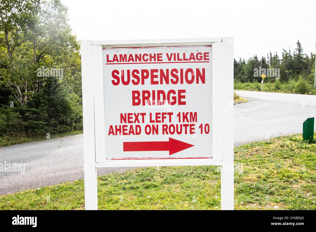 Directional sign to Lamanche Village suspension bridge on NL 10 in Bay ...