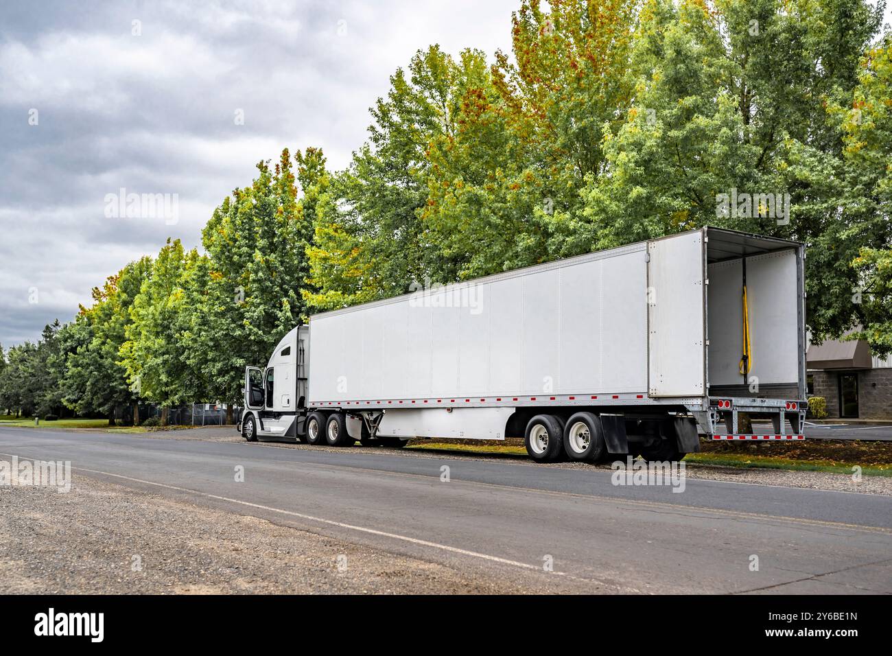 Industrial long hauler carrier white big rig semi truck with extended ...