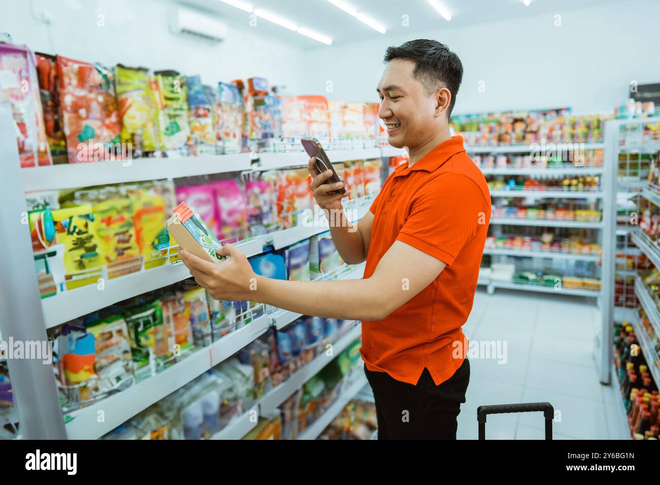 Supermarket asian seller man worker hi-res stock photography and images ...
