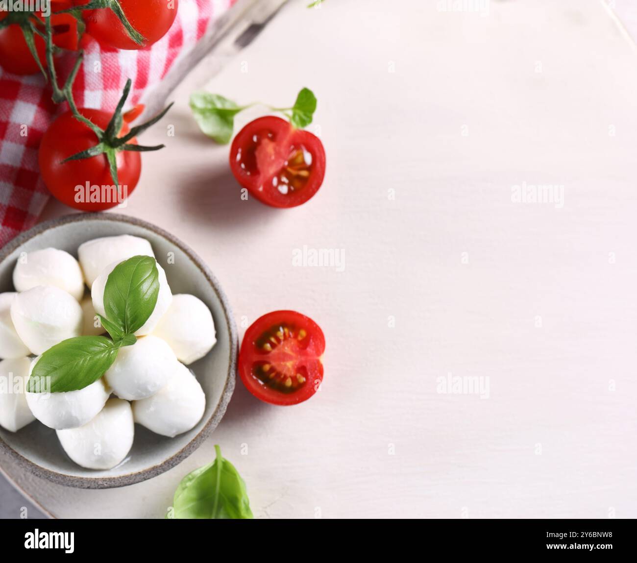 mini mozzarella cheese and tomatoes for salad Stock Photo - Alamy