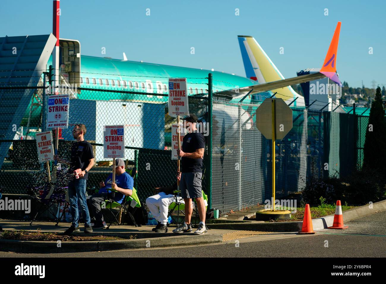 Boeing 737 Max aircrafts are seen behind fences as Boeing employees ...