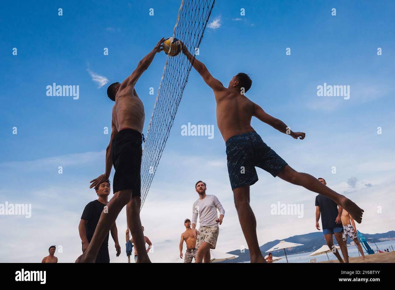 Multinational players play beach volleyball in Vietnam in the summer ...