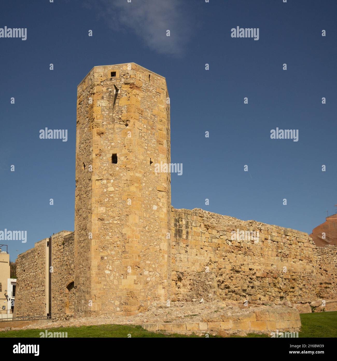 Tower of the era of ancient Rome in the modern urban landscape of ...