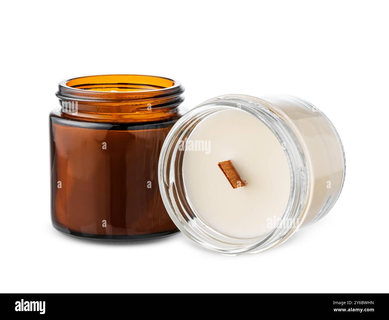 Glass jars filled with scented candles on a white background Stock ...