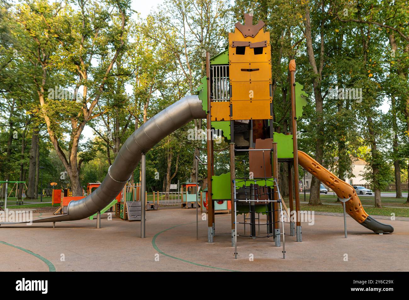 Children can explore a vibrant playground with slides and climbing ...