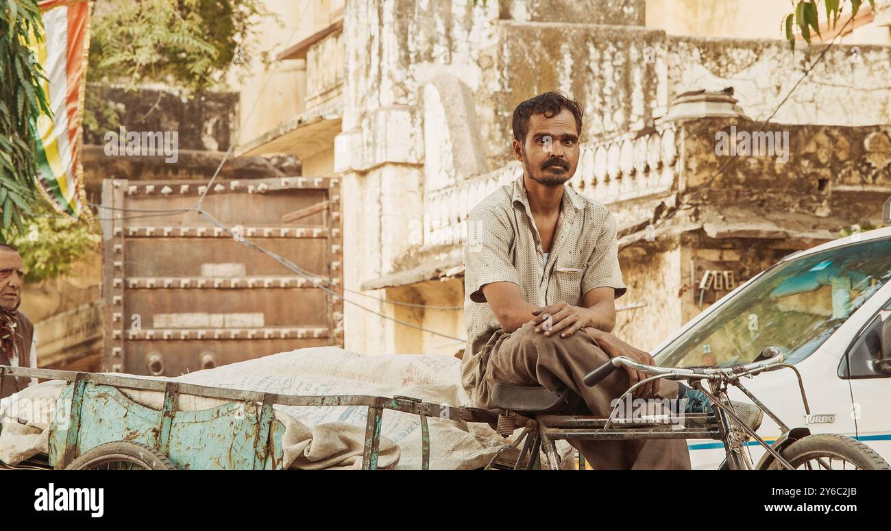 Jaipur, India. Indian Man On Cargo Bicycle Wait For Carries. Everyday ...