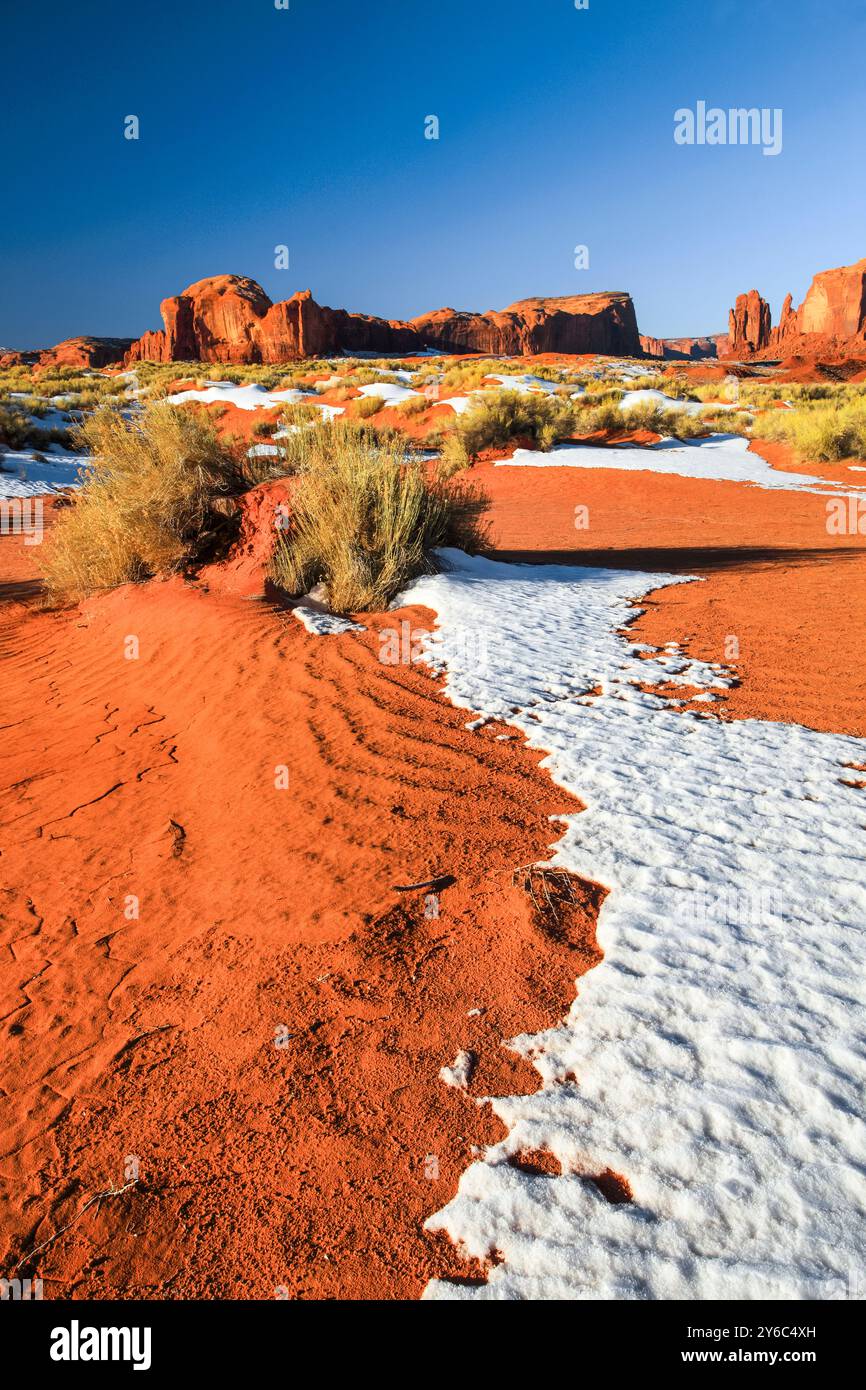 Pinnacles of rock (totem pole) and sand dunes in the Monument Valley in ...
