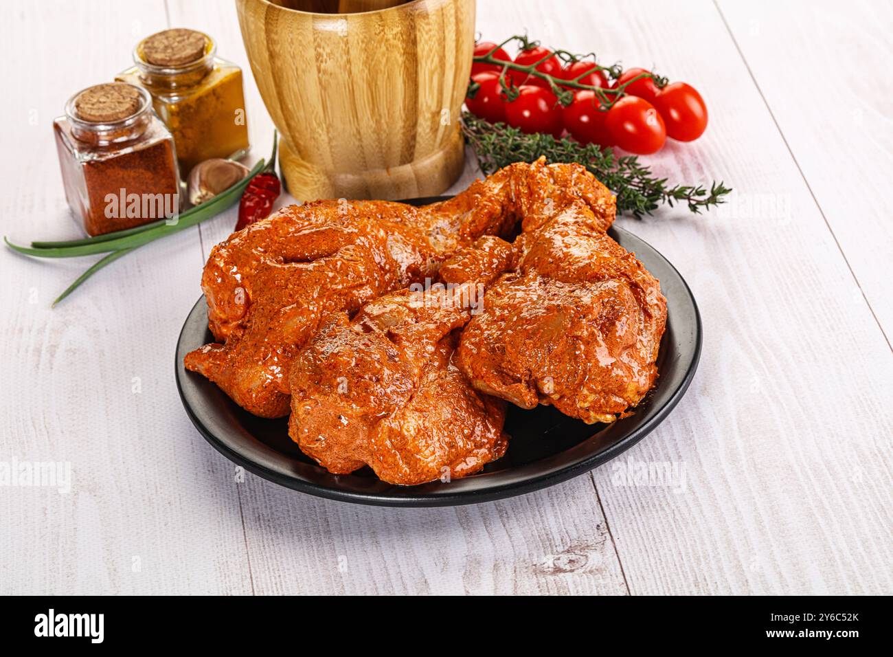 Raw turkey shoulder wing in Indian tandoori marinade spices Stock Photo ...