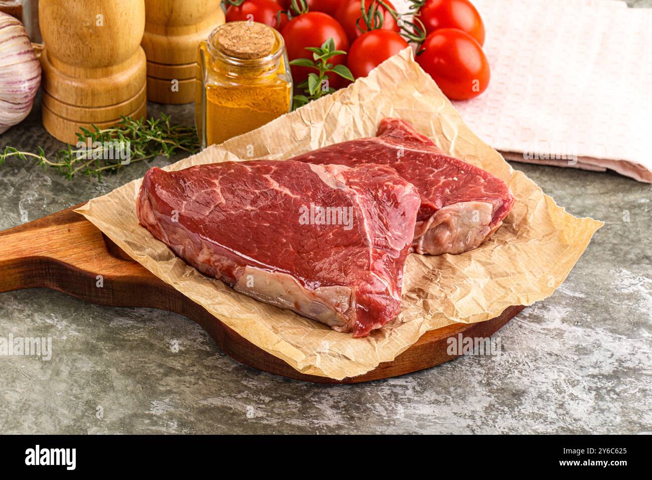 Raw marble uncooked prime beef steak Stock Photo - Alamy