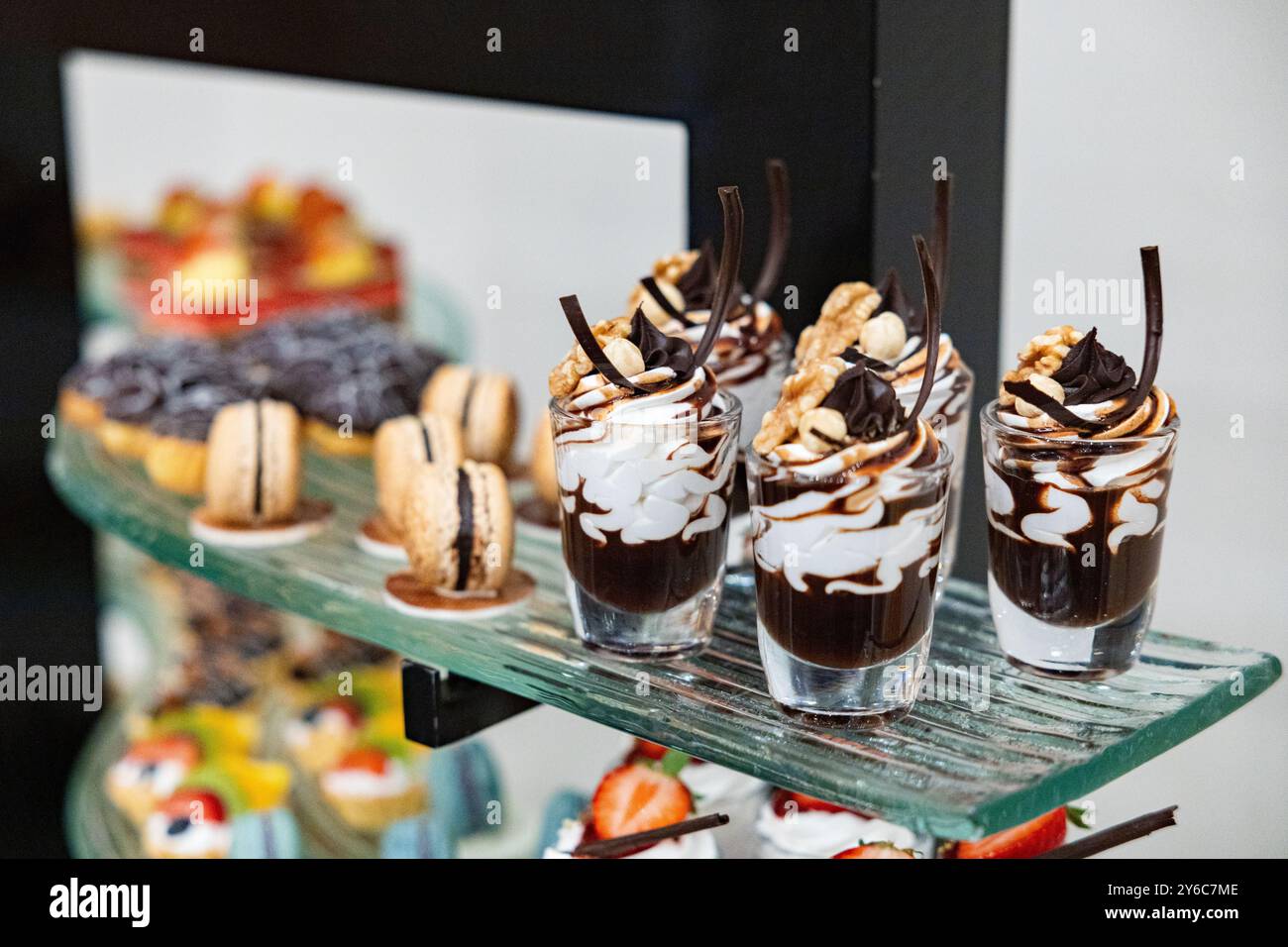 Different types of sweet desserts, mousses, biscuits. Candy bar mock up ...