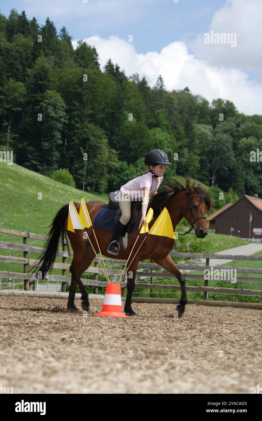 Young rider with Pony joining mounted games Stock Photo - Alamy