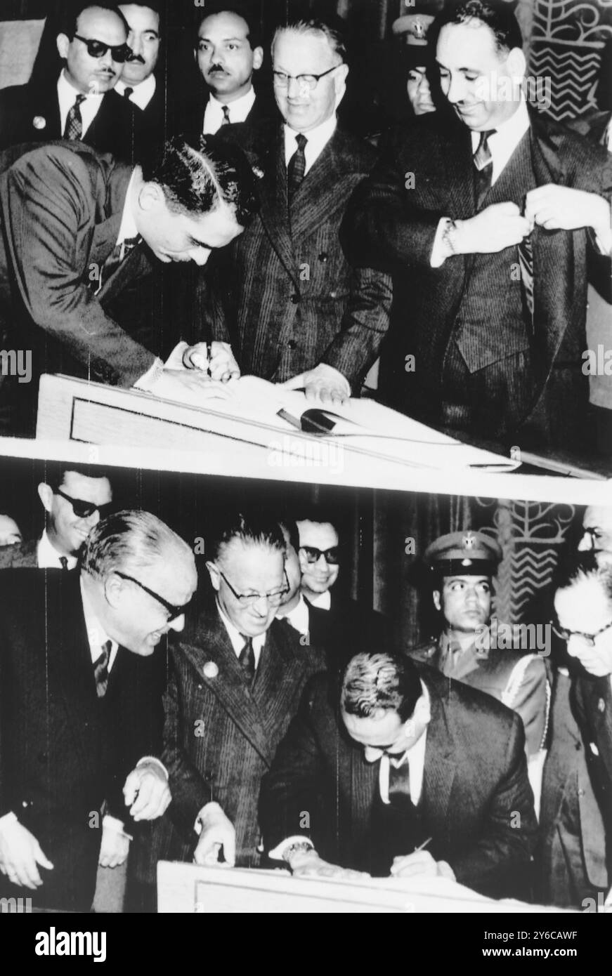 KING HUSSEIN SIGNS DOCUMENT AT CONFERENCE PAN ARAB IN CAIRO . ; 17 ...
