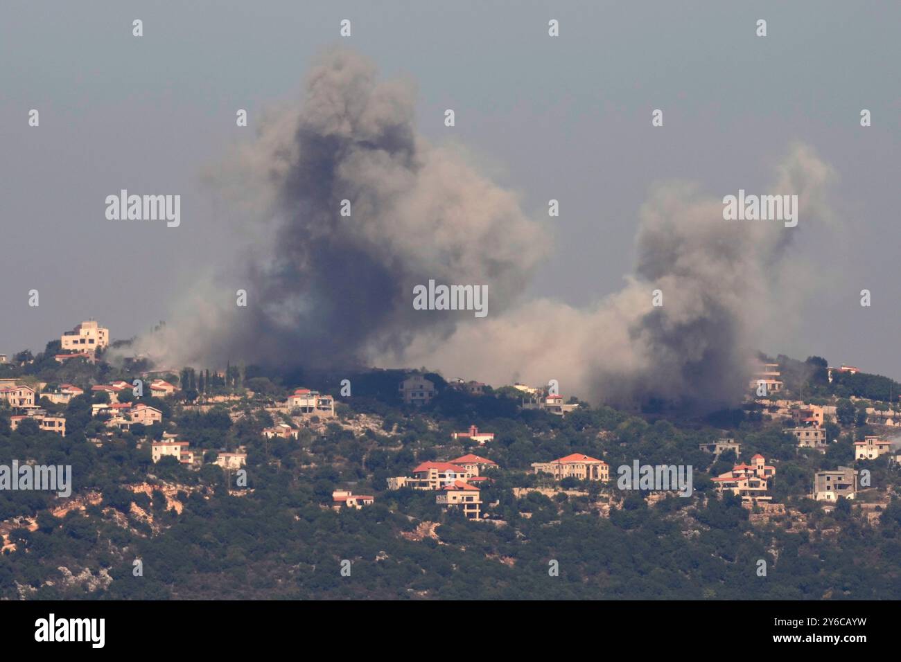 CORRECTS LOCATION Smoke rises from Israeli airstrikes in the southern ...